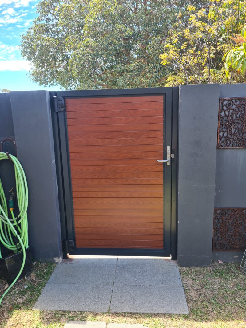 Aluminium Woodgrain Slat Gate — Craftsman Fencing, Perth